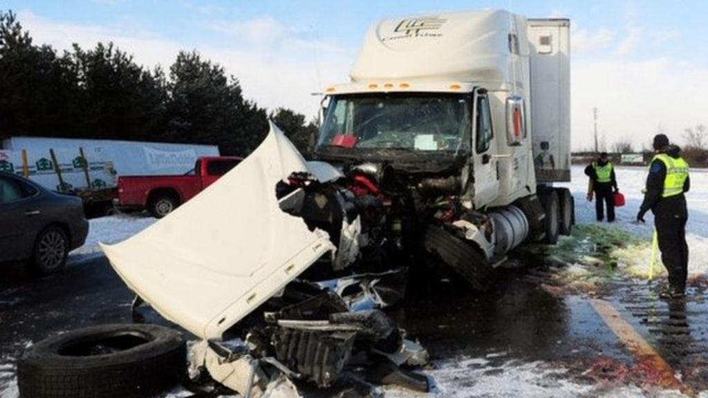 One dead after pile-up of over 100 vehicles in icy Michigan - BBC News