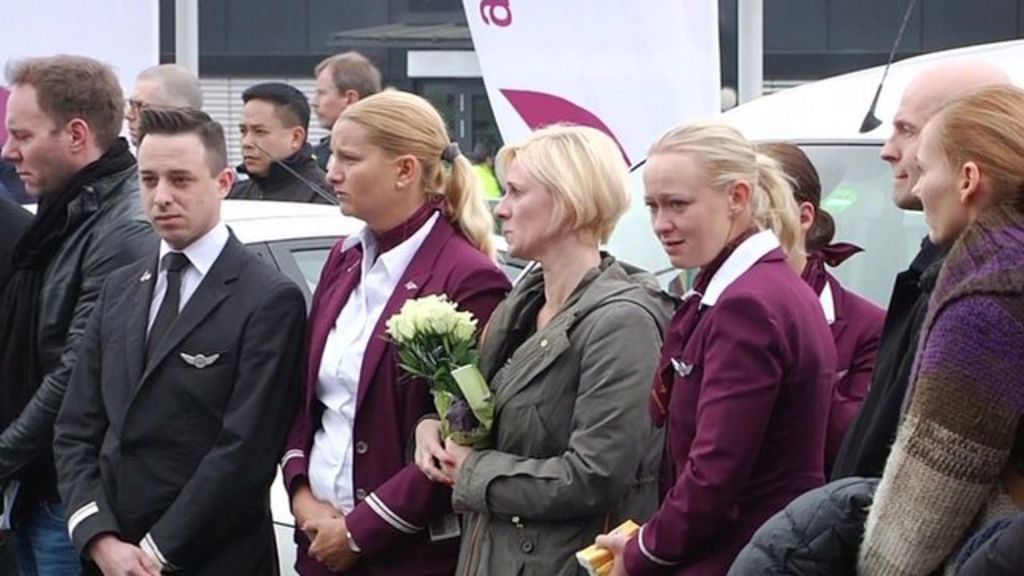 Staff at Germanwings observe a minute's silence - BBC News