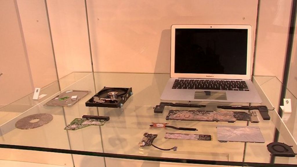 Edward Snowden's smashed laptop goes on show in London - BBC News