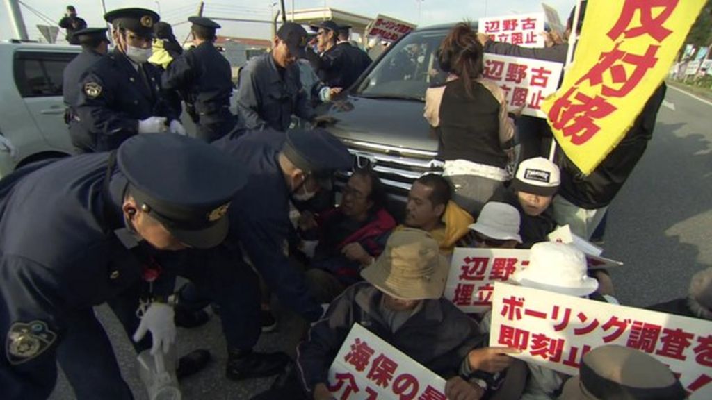 Okinawa residents protest over new US military base - BBC News
