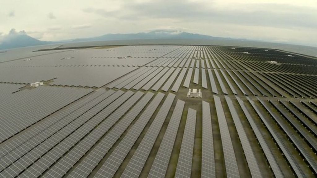 Giant solar farm in Japan seen from the air - BBC News
