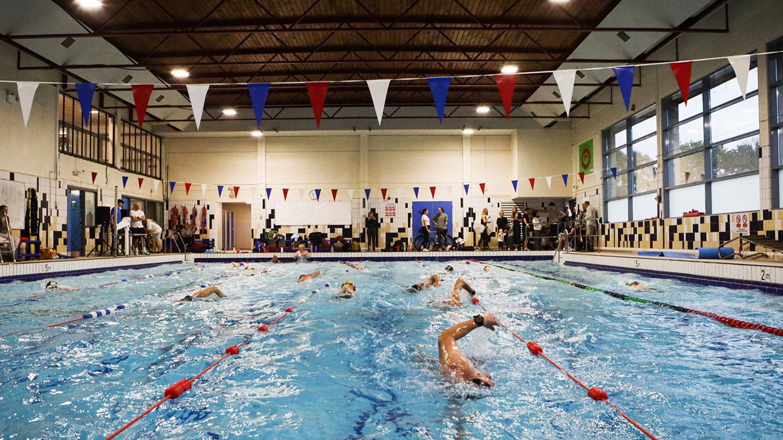 Flintshire: Man breaks ultra endurance triathlon record - BBC News