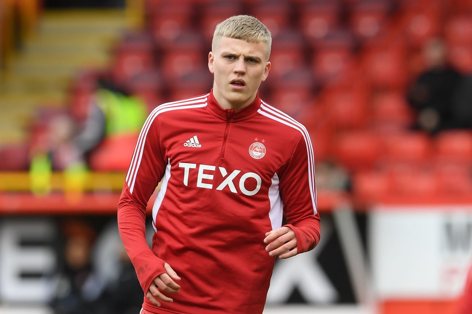 Duncan commits future to Dons with three-year deal - BBC Sport