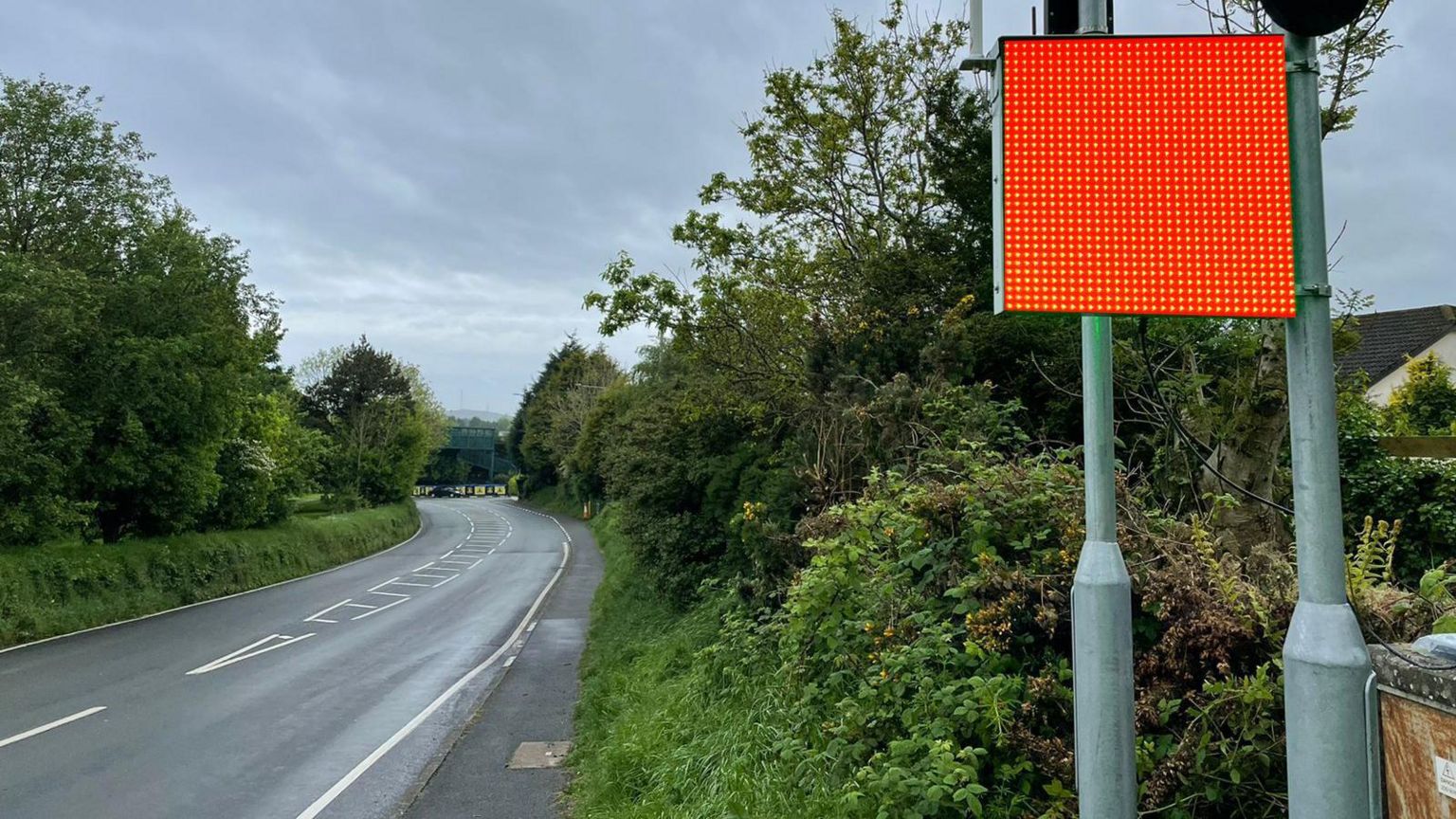Early morning testing session for TT course red flag system - BBC News