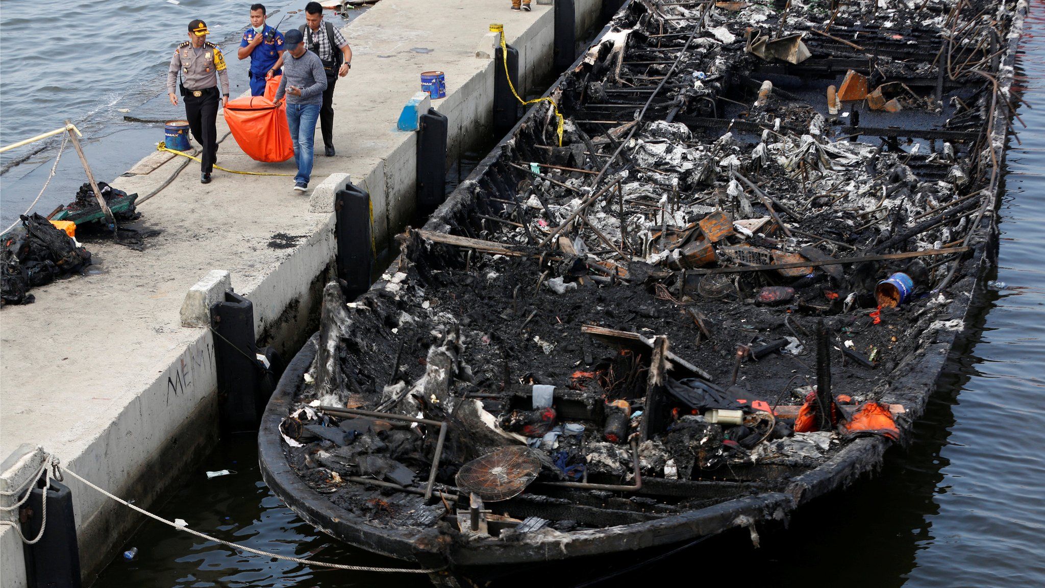 Indonesia boat carrying dozens of people capsizes, killing eight - BBC News
