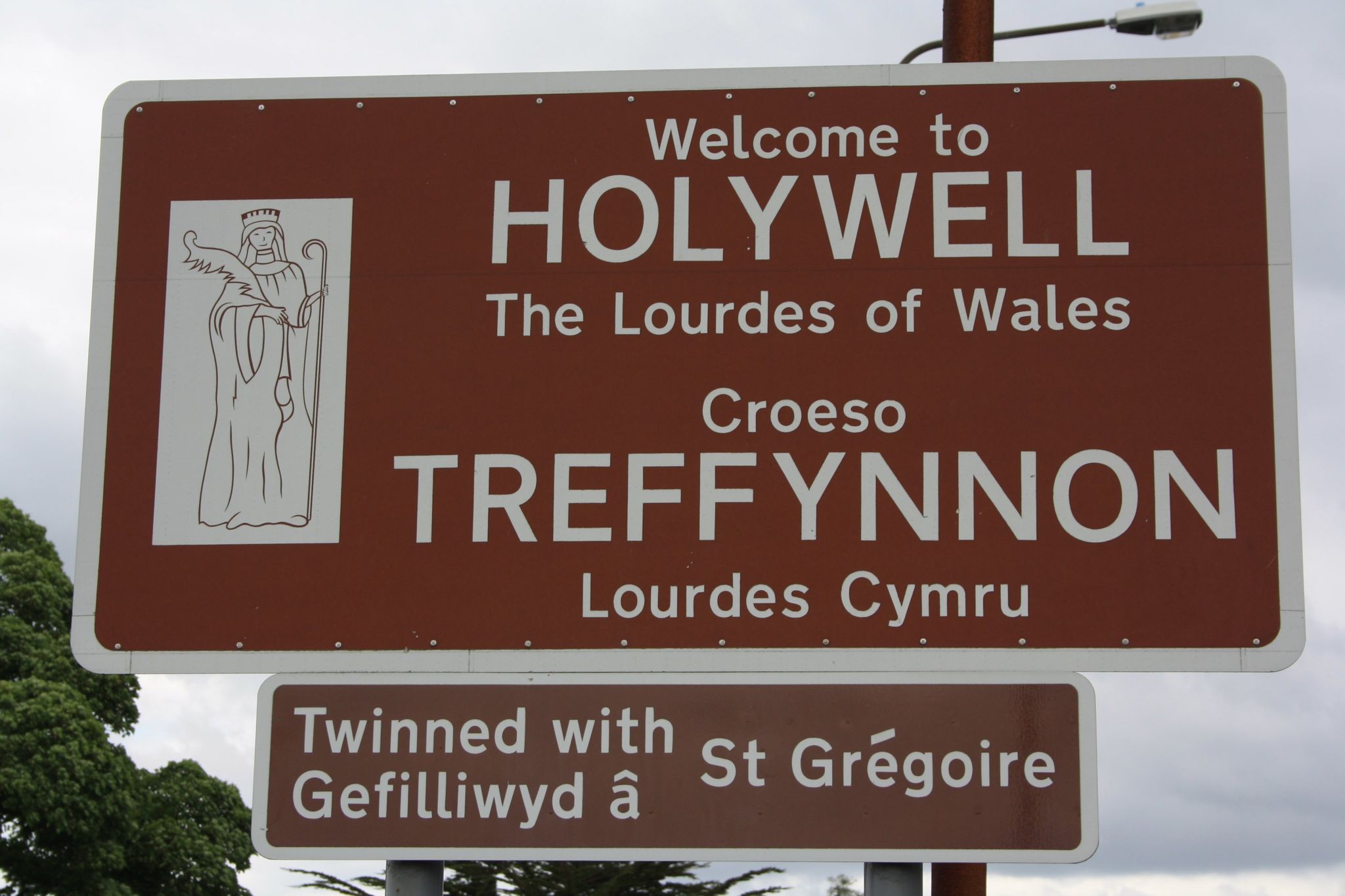 Walkers re-enact historic royal visit to St Winefride's Well - BBC News