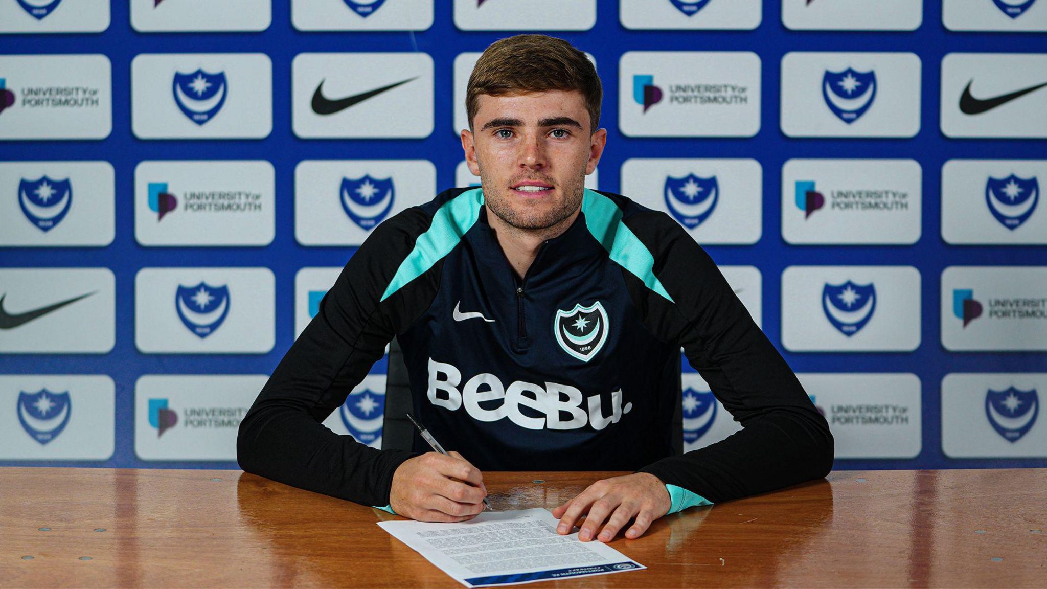 Zak Swanson signs new Portsmouth contract - BBC Sport