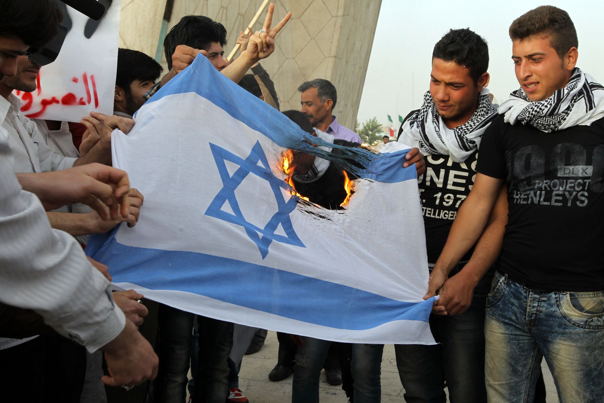 Georgian workers campaign for rights and Iranians urge respect for ...