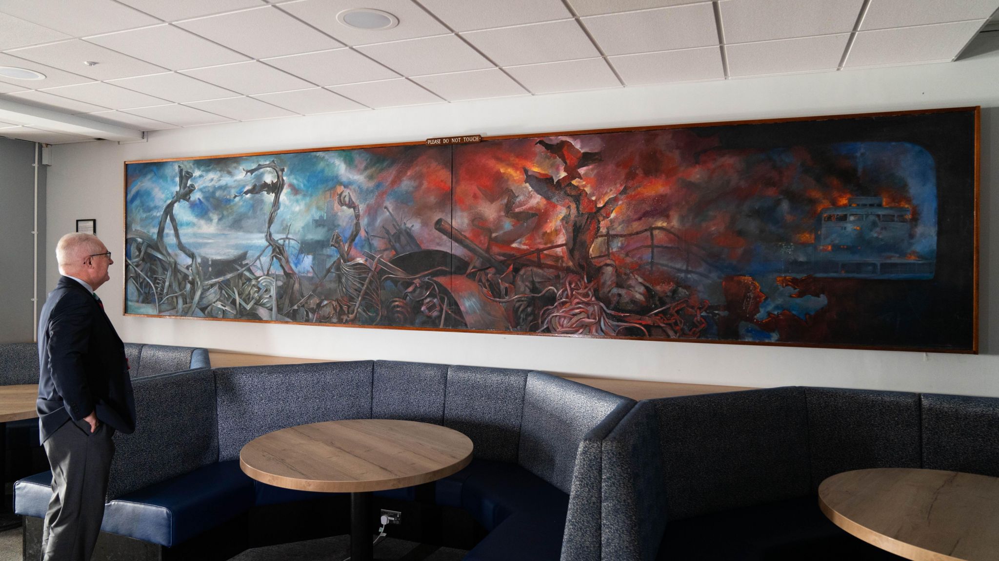 Search for mystery artist behind Falklands mural at HMS Raleigh - BBC News