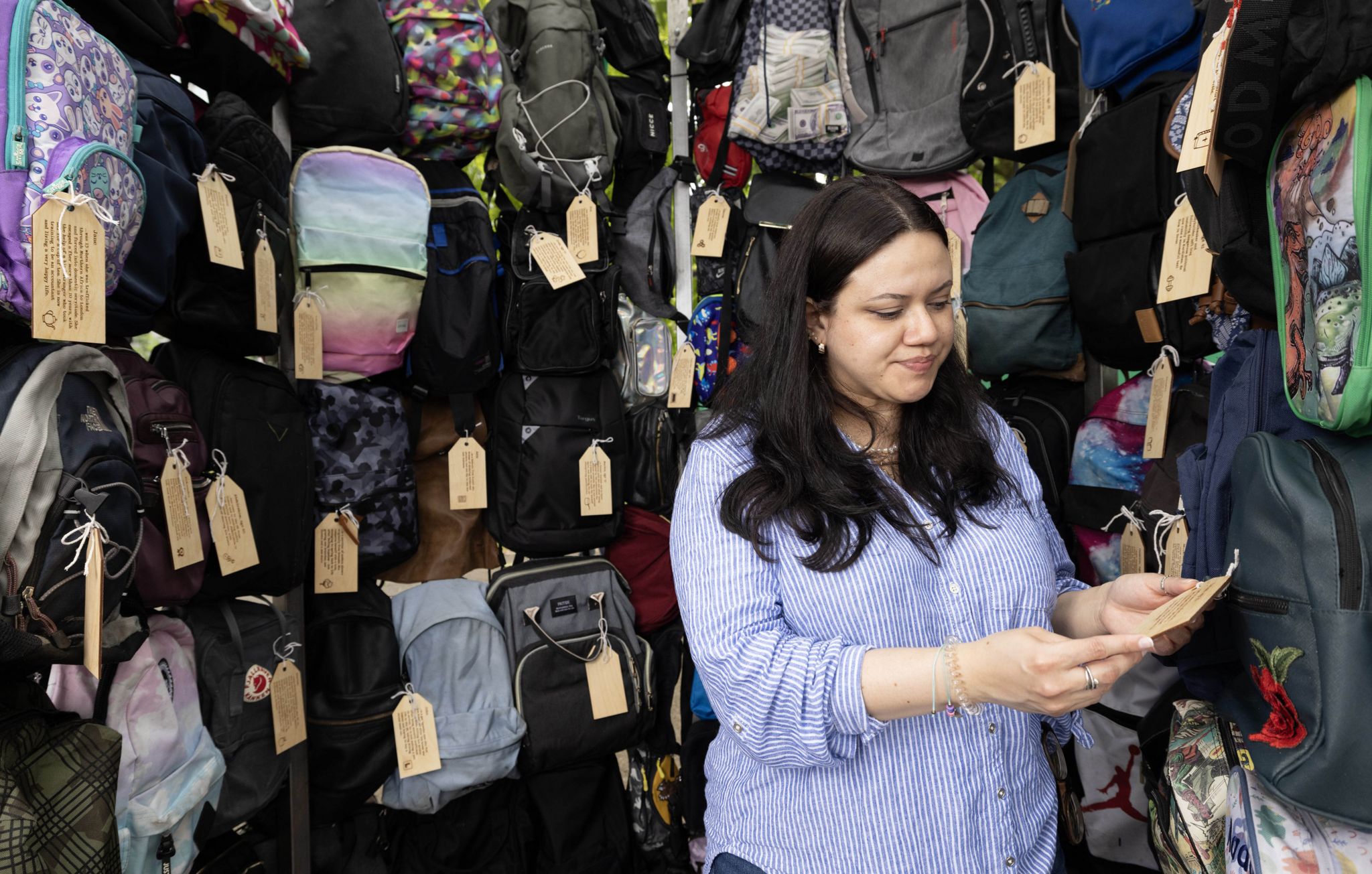 World Refugee Day: Backpack artwork unveiled - BBC News