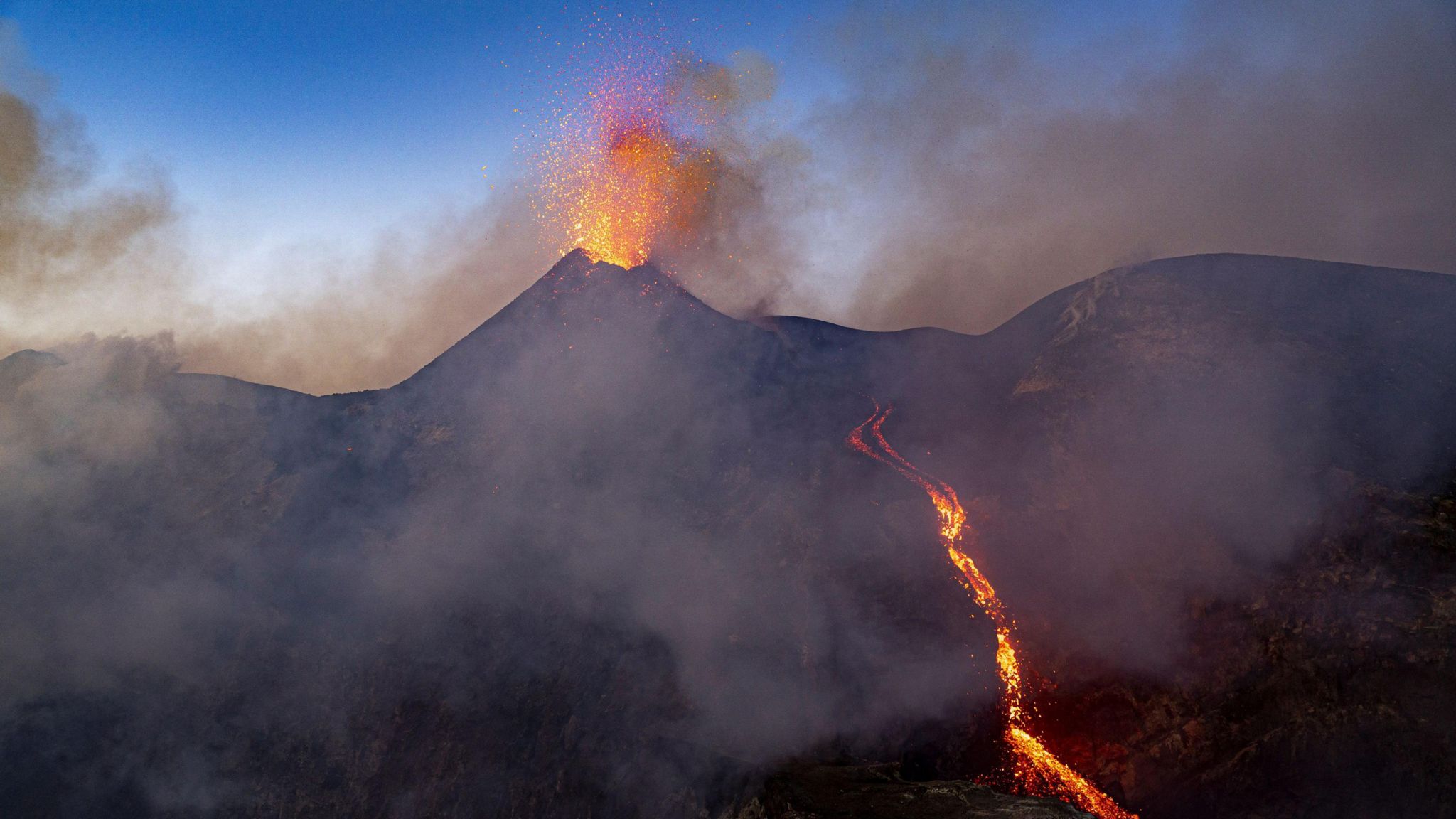 Watch: Mount Etna erupts over Italy - BBC Newsround