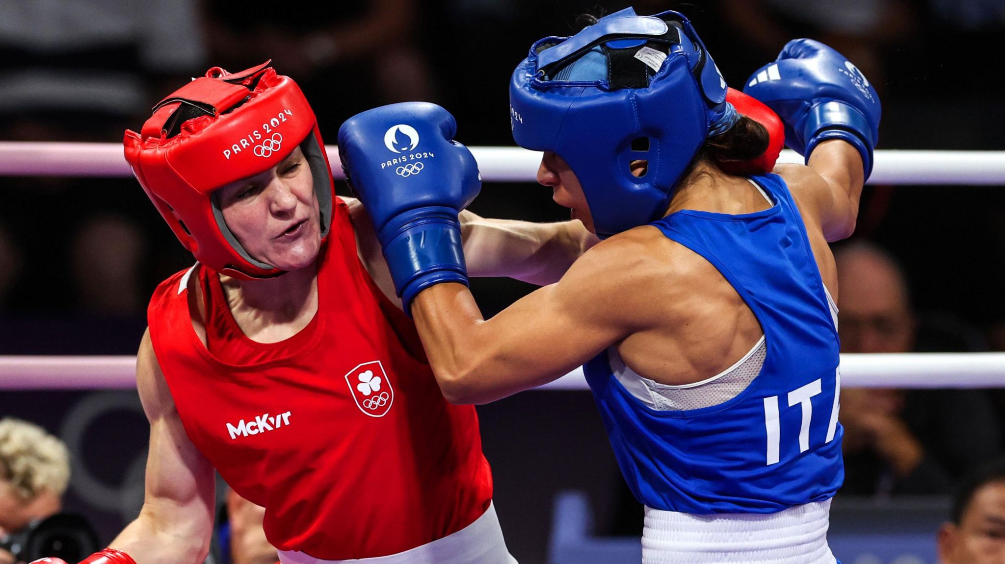Olympics boxing: Defending champion Kellie Harrington wins opener - BBC ...