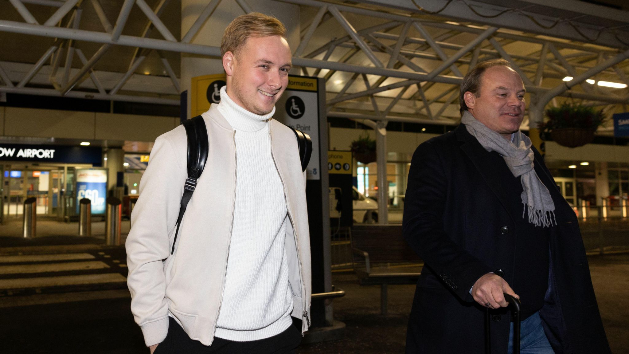Kuhn's agents arrive at Glasgow Airport - BBC Sport