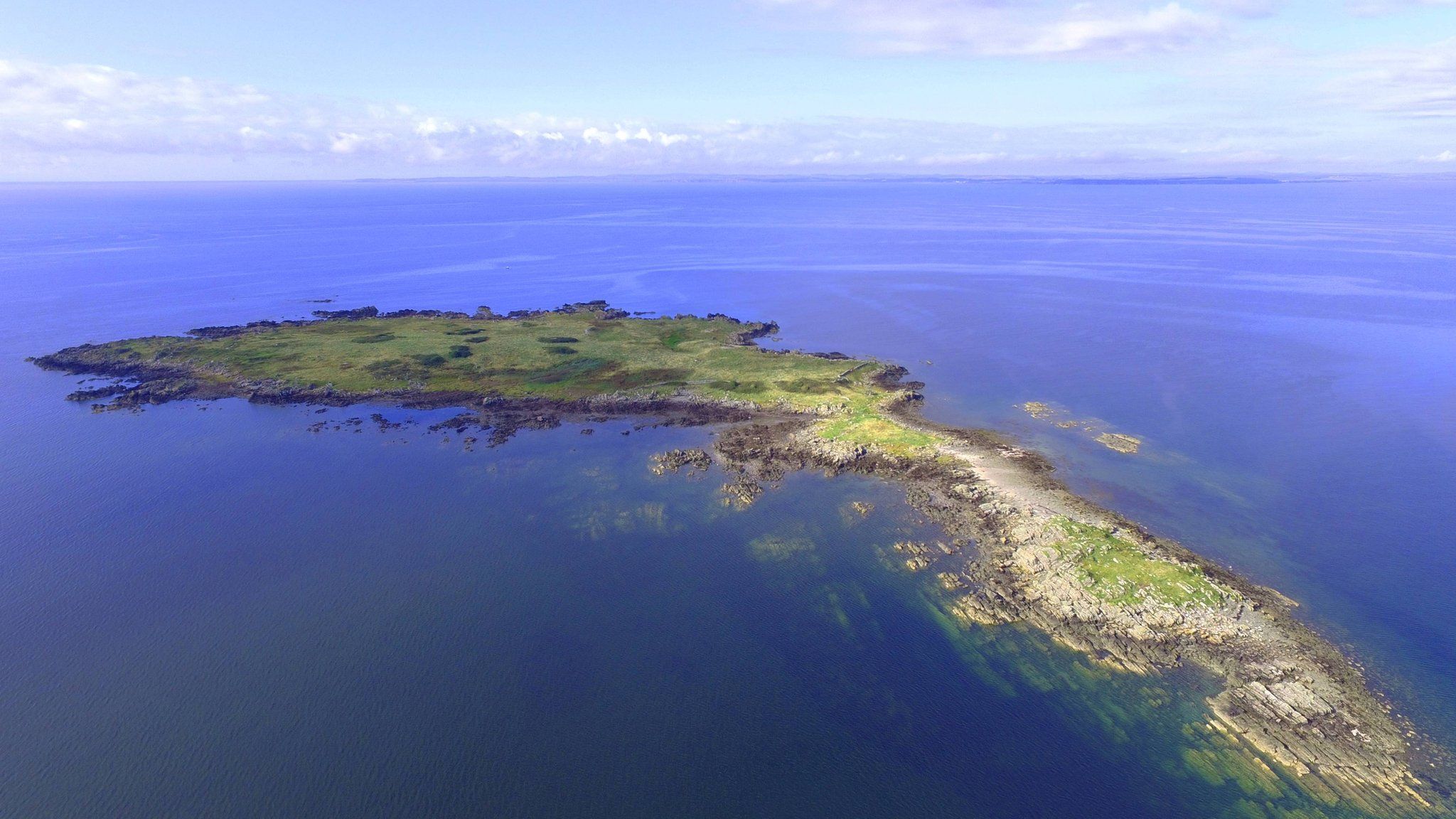 Global interest in small uninhabited Scots island - BBC News