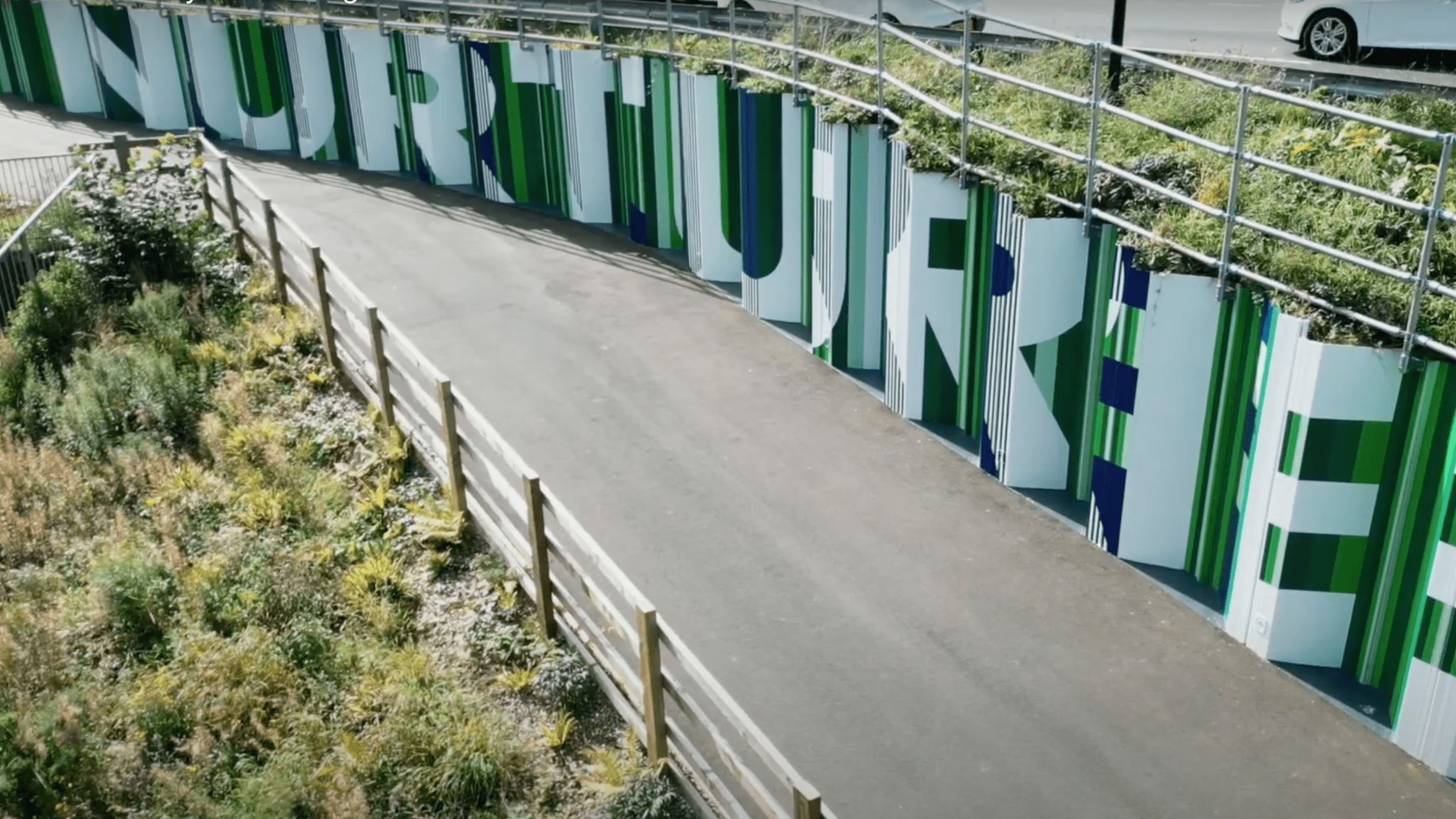 New mural brightens Plymouth pathway - BBC News