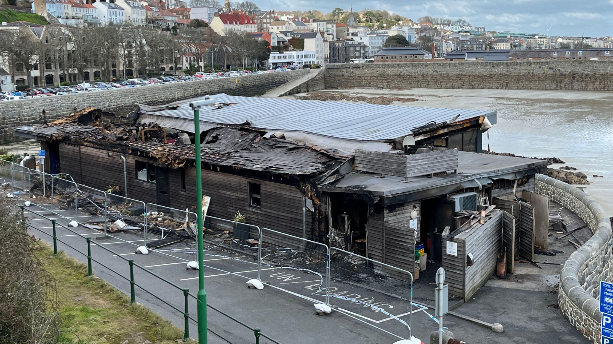 Police scene at Guernsey restaurant fire site closes - BBC News