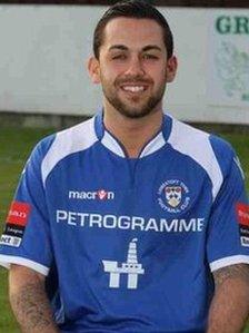 Homeless work helps footballer Erkan Okay turn life around - BBC News