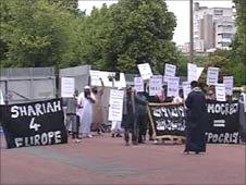 Thirty at protest in Cardiff against 'anti-Islam laws' - BBC News