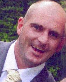 Michael Murphy: Washed-up body is missing Flintshire man - BBC News