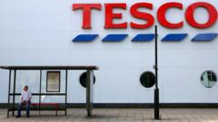 Tesco to replace 1,700 managers with lower-paid staff - BBC News