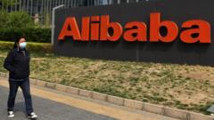 Alibaba: Shares dive after China spending slowdown warning - BBC News