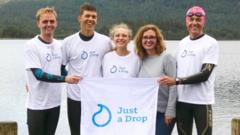 Swimmer completes 13 Lake District lakes in three days - BBC News