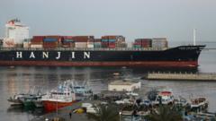 How Hanjin's collapse left a British artist stranded at sea - BBC News