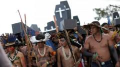 Brazil indigenous groups clash with police in Brasilia - BBC News