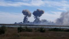 Crimea bridge partly reopens after huge explosion - Russia - BBC News