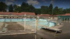 Free swimming as revamped Pontypridd lido opens - BBC News