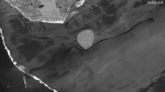 Mauritius oil spill: Locals scramble to contain environmental damage ...