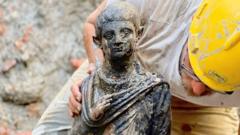 Ancient Rome: Stunningly preserved bronze statues found in Italy - BBC News