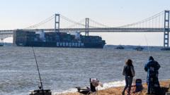 Suez Canal: Bulk carrier refloated after running aground - BBC News