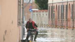 Italy floods leave 13 dead and force 13,000 from their homes - BBC News