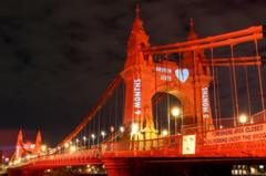 Hammersmith Bridge turned red in stunt by fed-up residents - BBC News