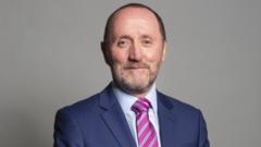 Tamworth MP Chris Pincher to stand down at next election - BBC News
