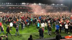 Bournemouth fans joy as Cherries return to Premier League - BBC News