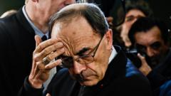 Pope rejects Cardinal Barbarin's resignation over abuse cover-up - BBC News