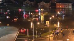 Torrential rain and thunderstorms bring flooding and disruption - BBC News
