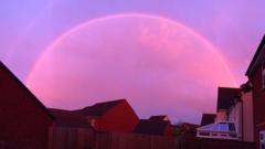 Rare 'pink rainbow' spotted in sky over Bristol - BBC News