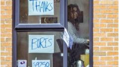 Window pain: Isolating university students send a message - BBC News