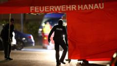 Germany shooting: Vigils held for victims of racist attack - BBC News