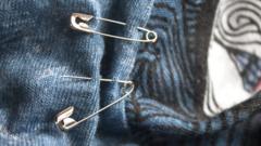 Why are people wearing safety pins after Trump victory? - BBC News