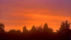 Spectacular pink and orange sunset lights up sky - BBC News