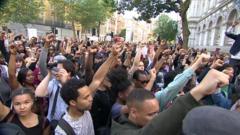 Hundreds join Black Lives Matter march through London - BBC News