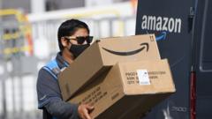 Amazon increases starting pay for UK workers again - BBC News