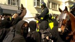 Officers injured during nationalist march through Brighton - BBC News
