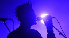 Climate change: Massive Attack gig data to cut live music impact - BBC News