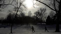 Record breaking freezing temperatures grip US - BBC Newsround
