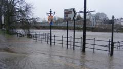 Dumfries River Nith flood barrier row breaks out - BBC News
